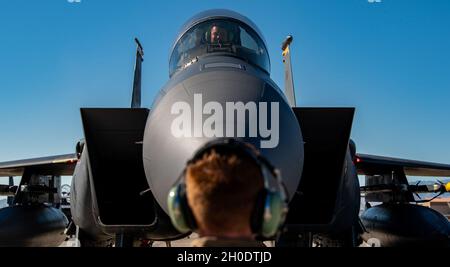 A 336th Tactical Fighter Squadron F-15E Eagle aircraft is readied for ...