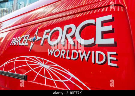 Parcel Force logo Worldwide on side of red delivery van Stock Photo - Alamy