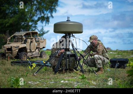 A tactical air navigation (TACAN) system van is positioned facing ...
