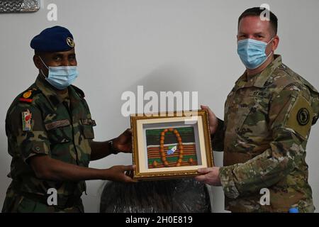 Lt. Col. Mohamed Djama Kyad (left), the Armed Forces of Djibouti (FAD ...
