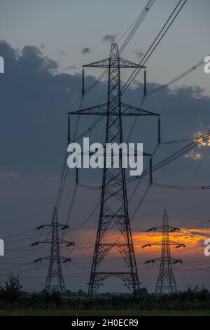 Storm clouds and power pylons, Kent, UK Stock Photo - Alamy