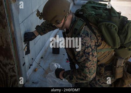 An Explosive Ordinance Disposal Marine with Marine Raider Regiment ...