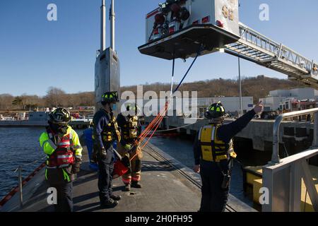 Firefighters from the Submarine Base Fire Department and surrounding ...
