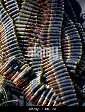 7.62mm ammunition for the M240B machine gun is staged for a live fire ...