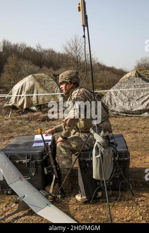 A Soldier, assigned to the Headquarters and Headquarters Company, 91st ...