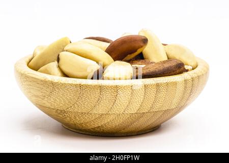 bowl with brazilian chestnut, on white insulator background. Brazil ...