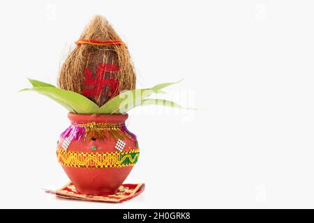 Traditional clay Kalash isolated on white. Hindu and Jain ritual ...