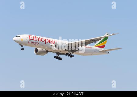 Ethiopian Cargo Boeing 777-200F aircraft flying. Freighter airplane of Ethiopian Cargo inbound ...