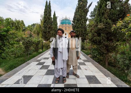 Man standing before the Mausoleum of Mirwais Khan Hotaki, Kandahar ...