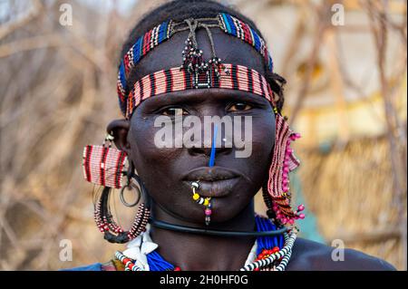 Traditional dressed woman of the Jiye tribe, Eastern Equatoria State ...