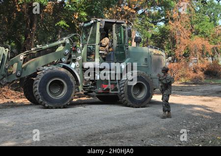 A U.S. Marine assigned to Engineer Equipment Instruction Company (EEIC ...