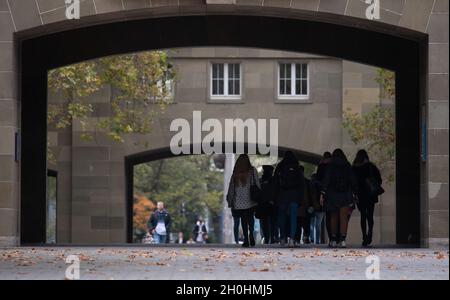 Mainz, Germany. 12th Oct, 2021. Students walk across the campus of ...