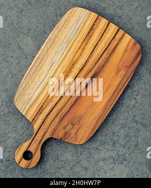 Cooking utensils empty stone cutting board with copy space for text or ...