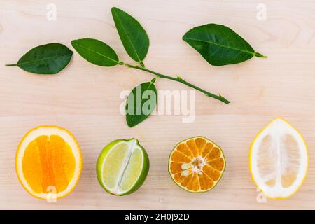 Mixed citruses fruit oranges, lemon on wooden background with or Stock ...