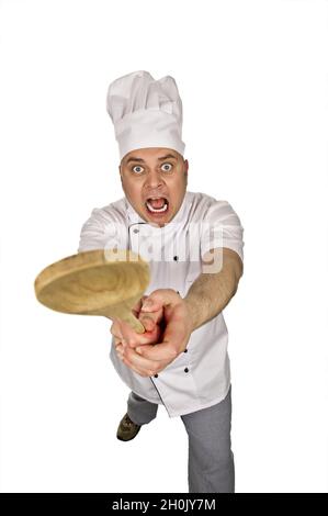 aggressive cook with wooden spoon Stock Photo - Alamy