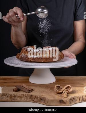 Woman cutting food for dessert in kitchen at home Stock Photo - Alamy