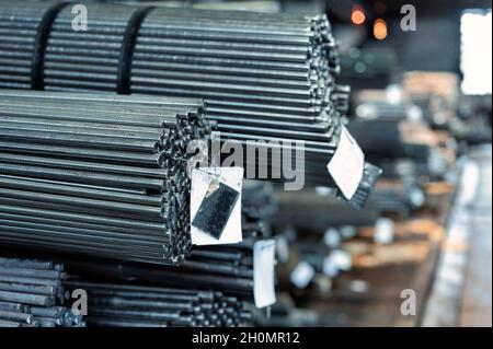 Hot rolled steel, bundle of round metal rods close-up Stock Photo - Alamy