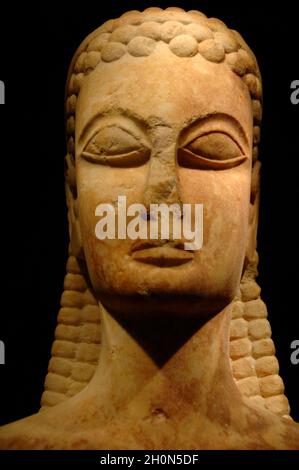 Kouros of the sacred gate ancient statue of young man on black ...