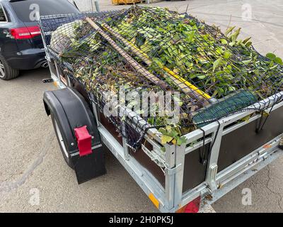 Trailer with green waste for recycling Stock Photo - Alamy