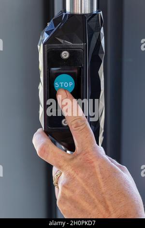 Stop request button in a bus Stock Photo - Alamy