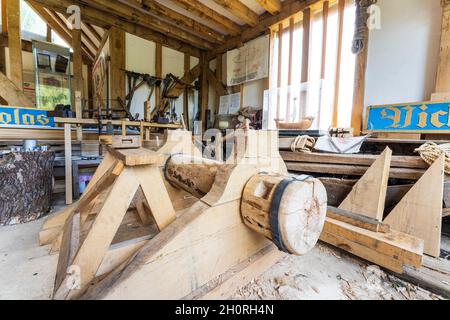 Large round oak log being fashioned into a cog medieval cog's capstan ...