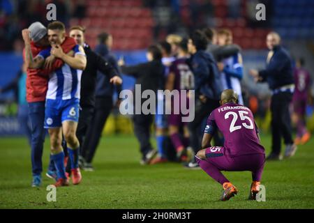 Manchester City's Fernandinho appears dejected as Wigan Athletic’s Max ...