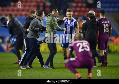 Manchester City's Fernandinho appears dejected as Wigan Athletic’s Max ...