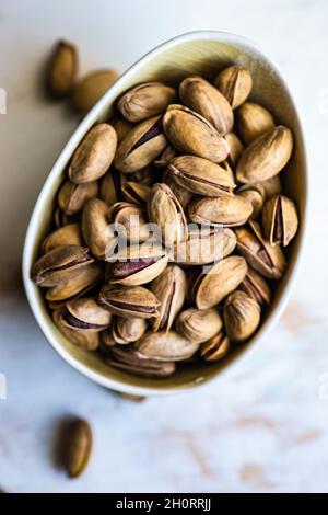 Pistachio nuts with shell ready to eat in sacks Stock Photo - Alamy