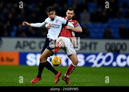 Bolton Wanderers’ Tyler Walker and Bristol City's Bailey Wright compete ...