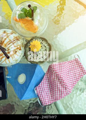 Small orange glass vase with two decorative ears of wheat Stock Photo ...