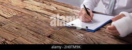 Worker Filling Social Security Benefits And Disability Insurance ...