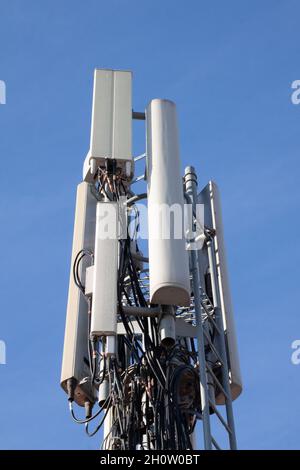 Vertical shot of an electrical transformer with the clear skies in the ...