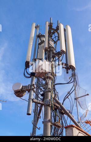 Vertical shot of an electrical transformer with the clear skies in the ...