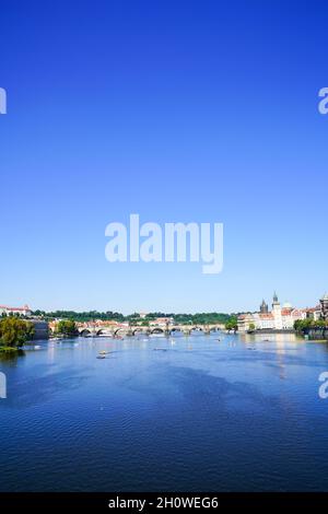 Palacky Bridge with tramlines and cables overlooking Vltava River and ...