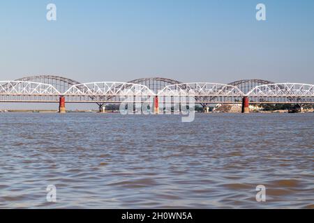 The Yadanabon Bridge is crossing the Irrawaddy river Stock Photo - Alamy