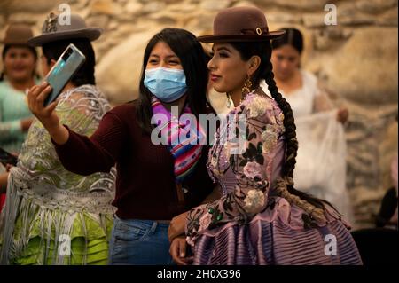 La Paz, Bolivia. 14th Oct, 2021. A model presents a typical dress ...