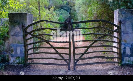 typical Minorcan gate made in wood with landscape behind. Menorca ...