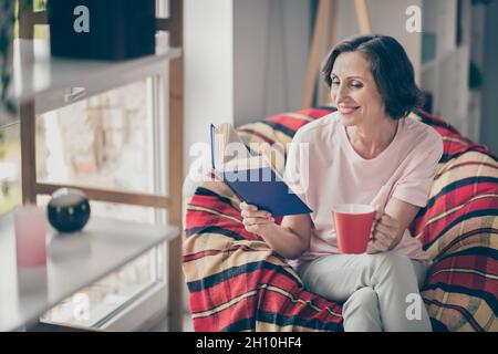Photo of pretty shiny girl wear xmas green pullover lying floor ...