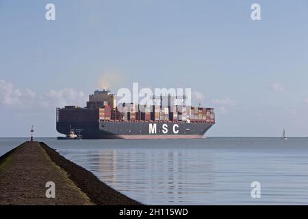 Container ship MSC Isabella leaving the Port of Felixstowe, Suffolk, UK ...