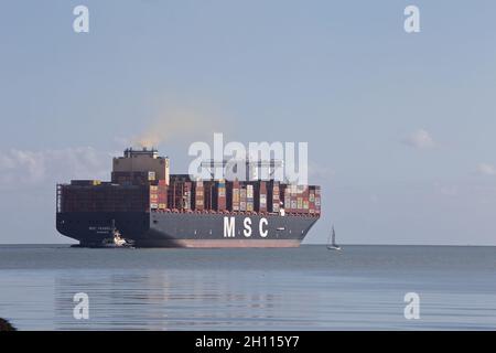 Container ship MSC Isabella leaving the Port of Felixstowe, Suffolk, UK ...