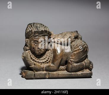 Phoenician figurine of a crouching woman, 900-800 B.c Phoenicia was a ...
