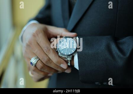 Man's watch on hand. Wedding ceremony Stock Photo - Alamy