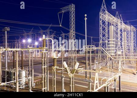 Electric substation at night Stock Photo - Alamy