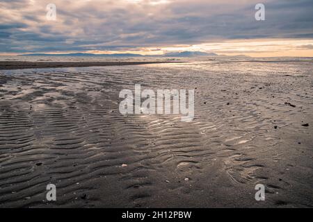 A beautiful sunset over the shoreline to Arran Hills in winter colours ...