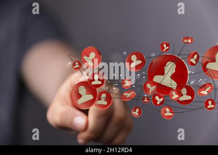 Person tapping 3D rendered floating human icons Stock Photo - Alamy