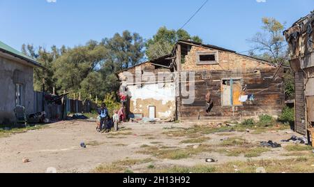 Roma houses. Gypsy slums on the outskirts of Uzhgorod in a roma village ...