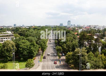 Panoramic view of busy boulevard seeing from building tower observation ...