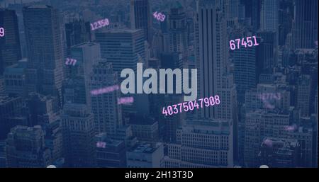 Image of falling numbers over cityscape Stock Photo - Alamy