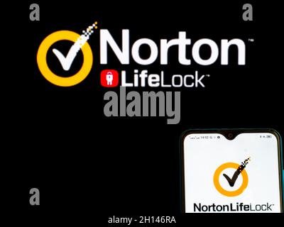 In this photo illustration a NortonLifeLock Inc logo is seen on a ...