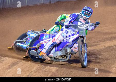 Jason Doyle of Australia (White) locks up behind Dmitri Berge of France ...
